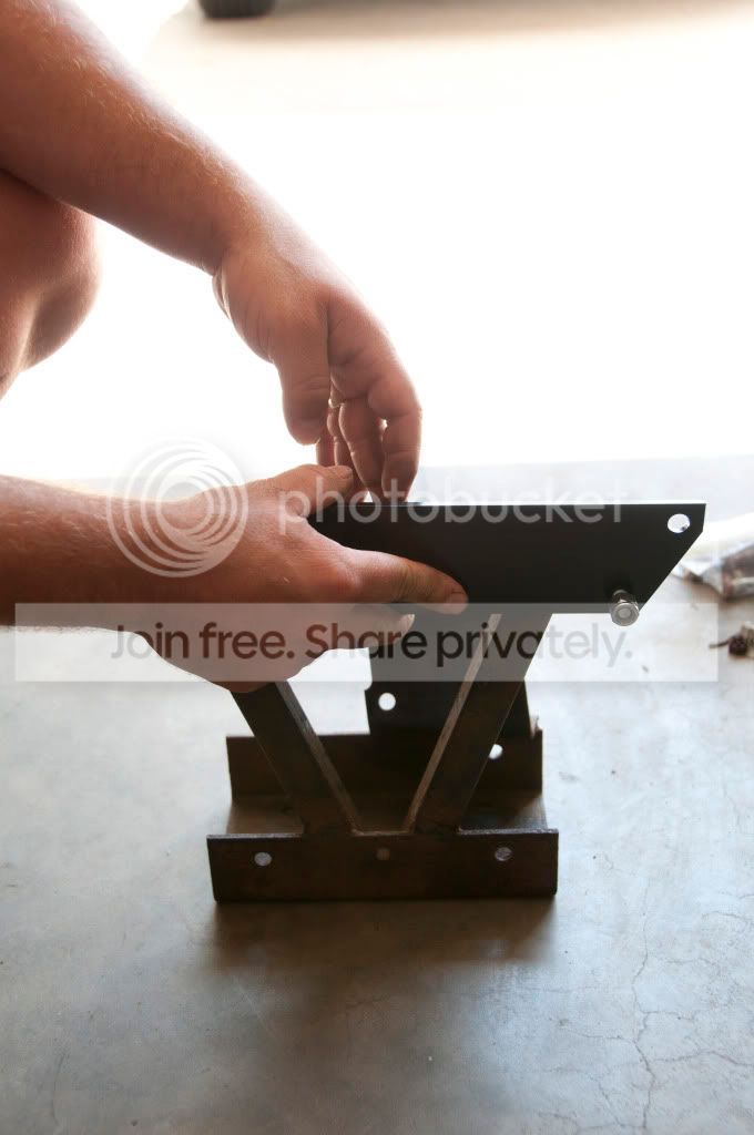 Where does the shock mount plate go?